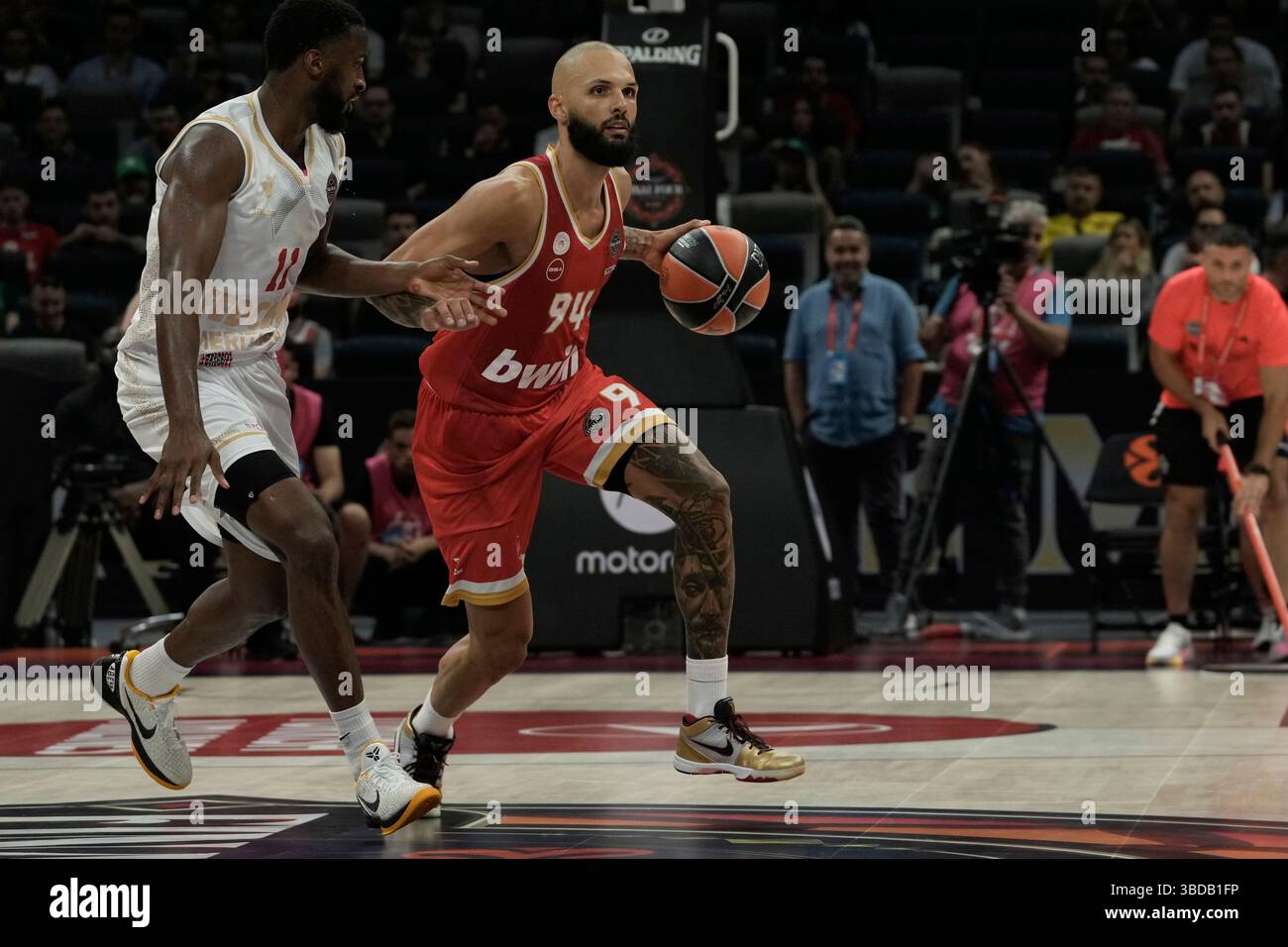 Monaco's Alpha Diallo guards Olympiacos' Evan Fournier duirng the Euroleague seimifinal ...