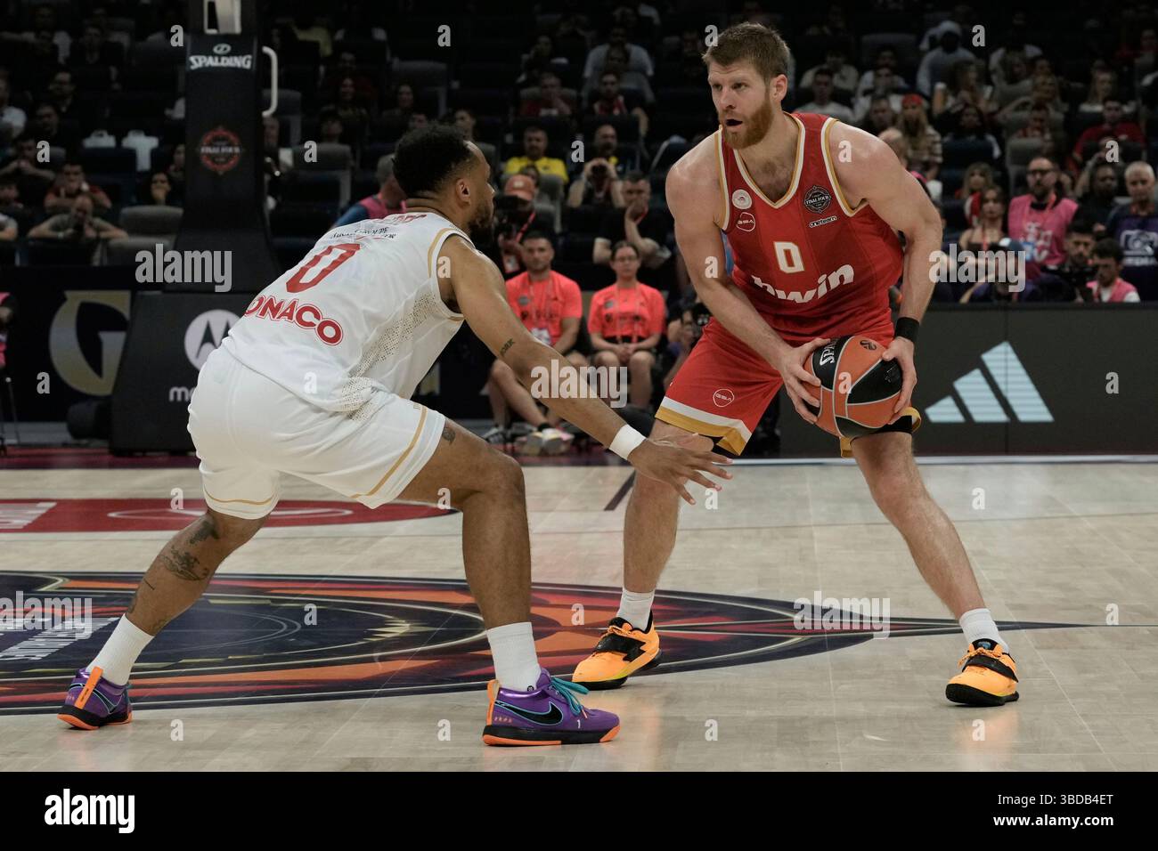 Monaco's Elie Okobo guards Olympiacos' Thomas Walkup duirng the ...