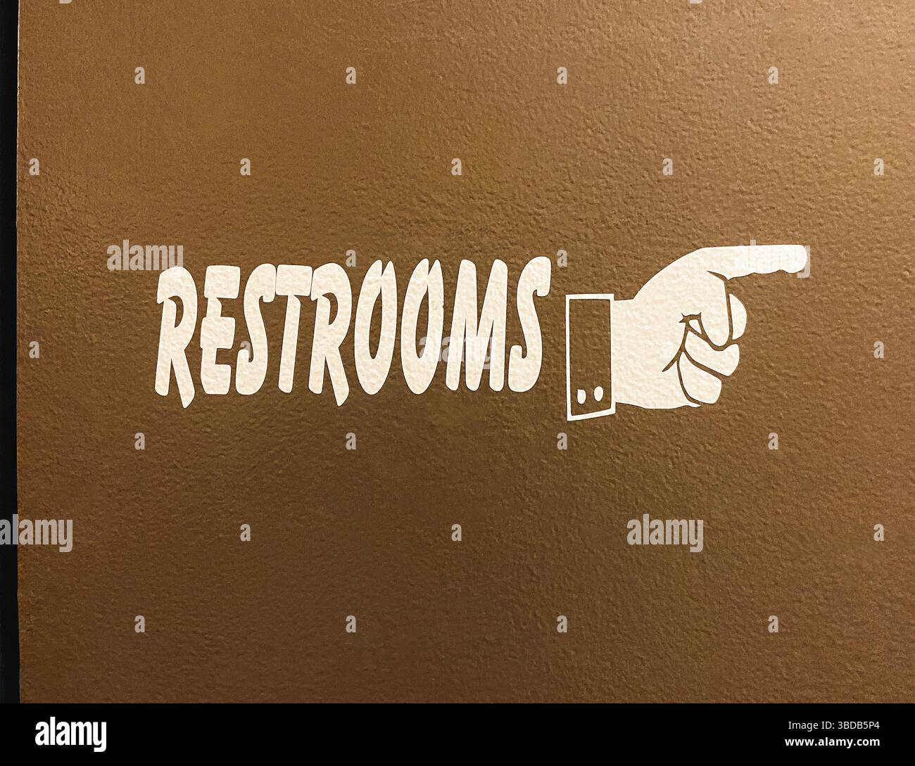 hand symbol pointing way to restrooms Stock Photo - Alamy