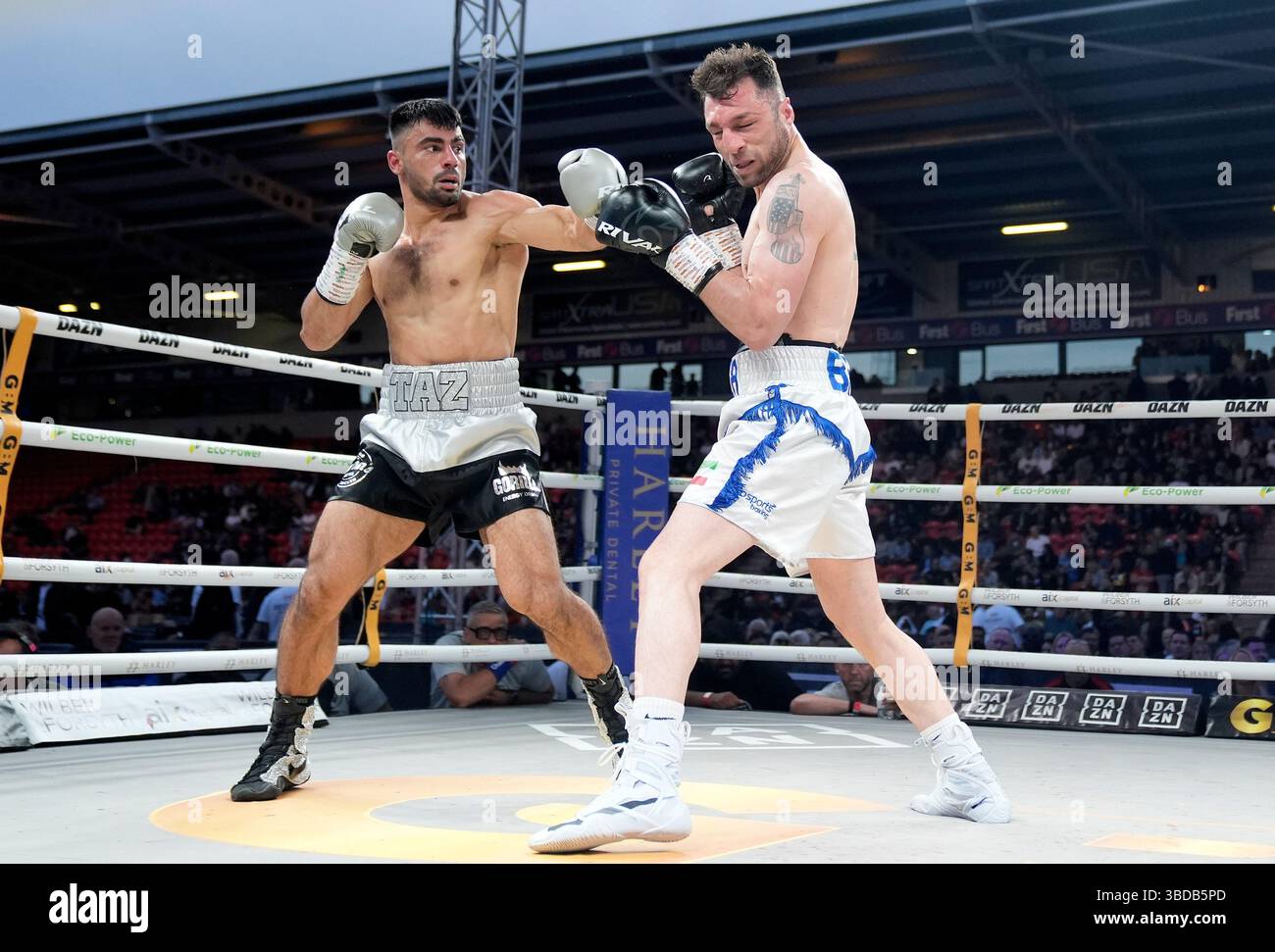 Taz Nadeem (left) and Bahadur Karami in action during their super ...