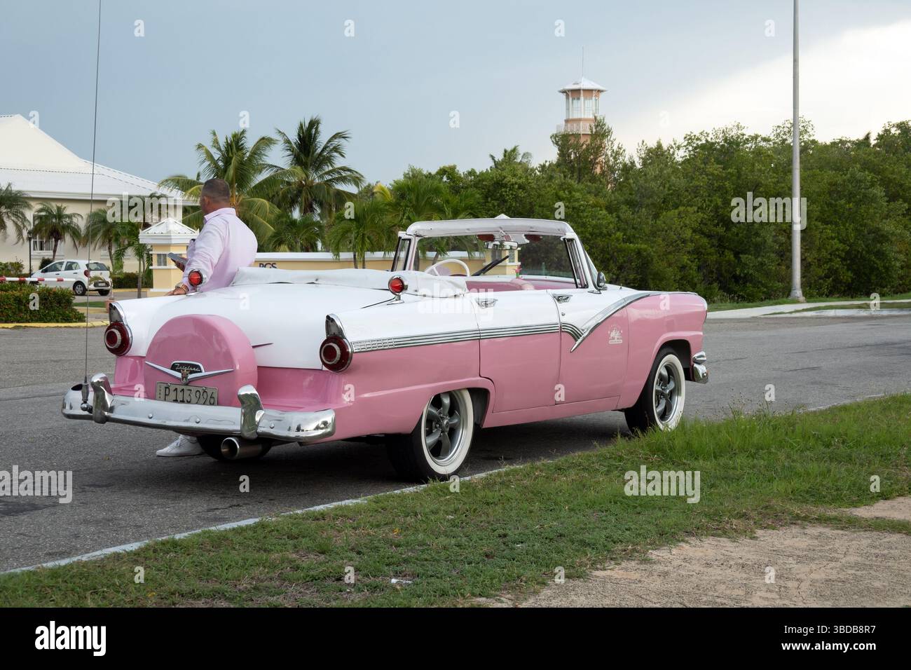 VARADERO, CUBA - AUGUST 31, 2023: Taxi driver and Ford Fairlane ...