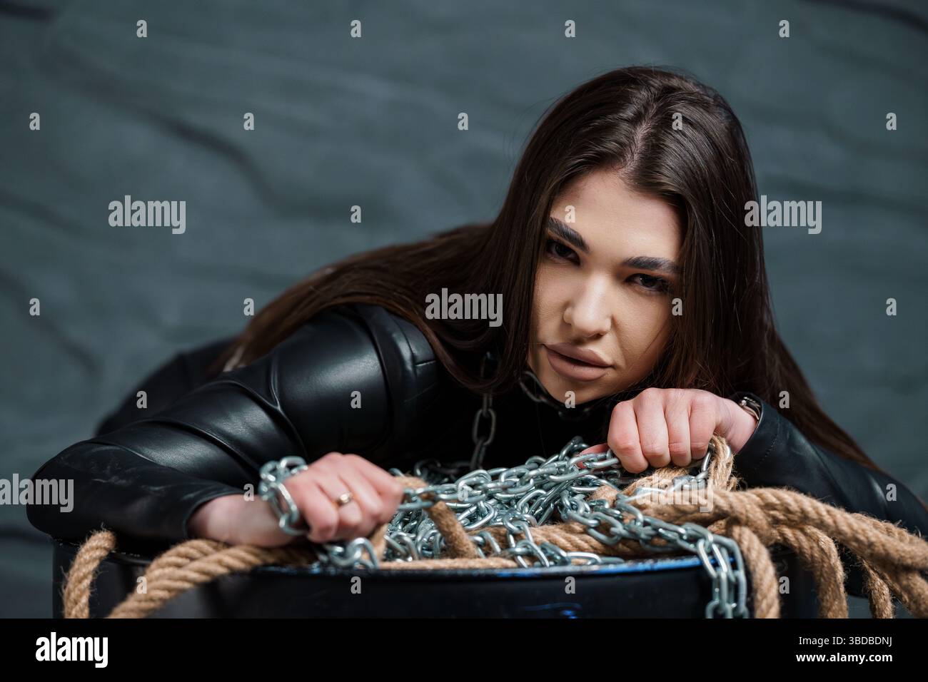 Captive Woman with Chains: A Dramatic Portrait of a Young Woman Bound ...