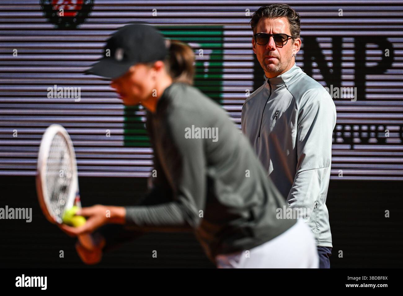 Iga SWIATEK of Poland with his coach Wim FISSETTE during a training ...