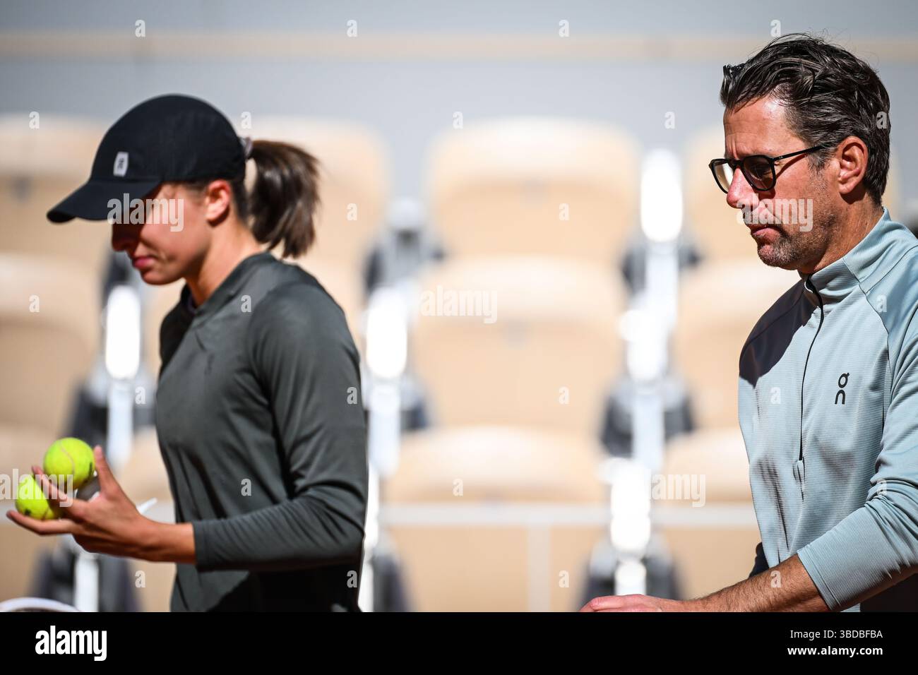 Iga SWIATEK of Poland with his coach Wim FISSETTE during a training ...