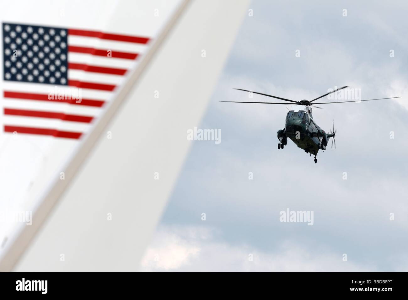 Marine One, with President Donald Trump on board, prepares to land next ...
