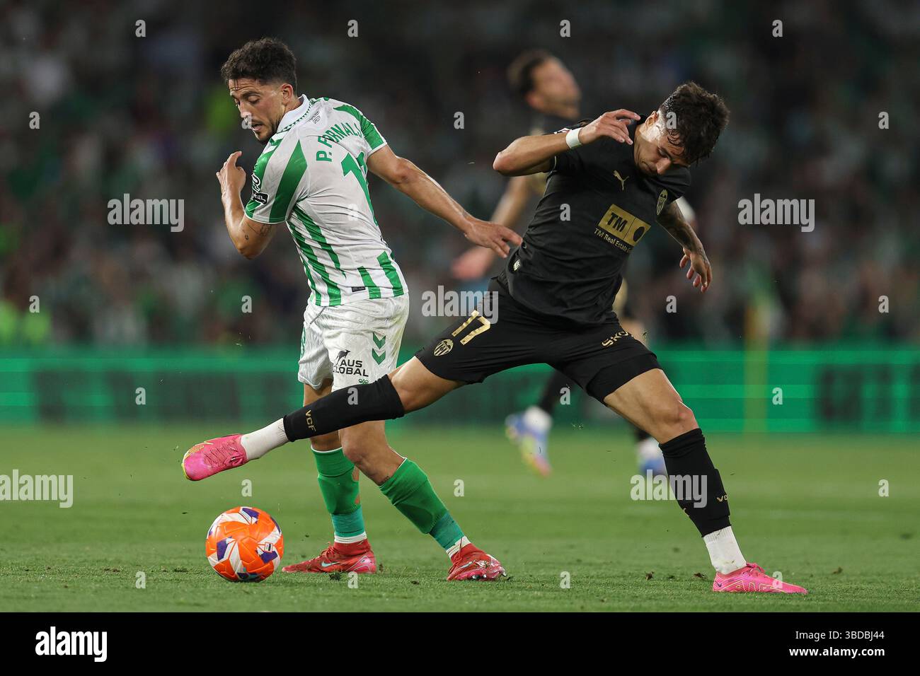 Sevilla, Spain. 24th May, 2025. Pablo Fornals of Real Betis and Ivan Jaime of Valencia during ...