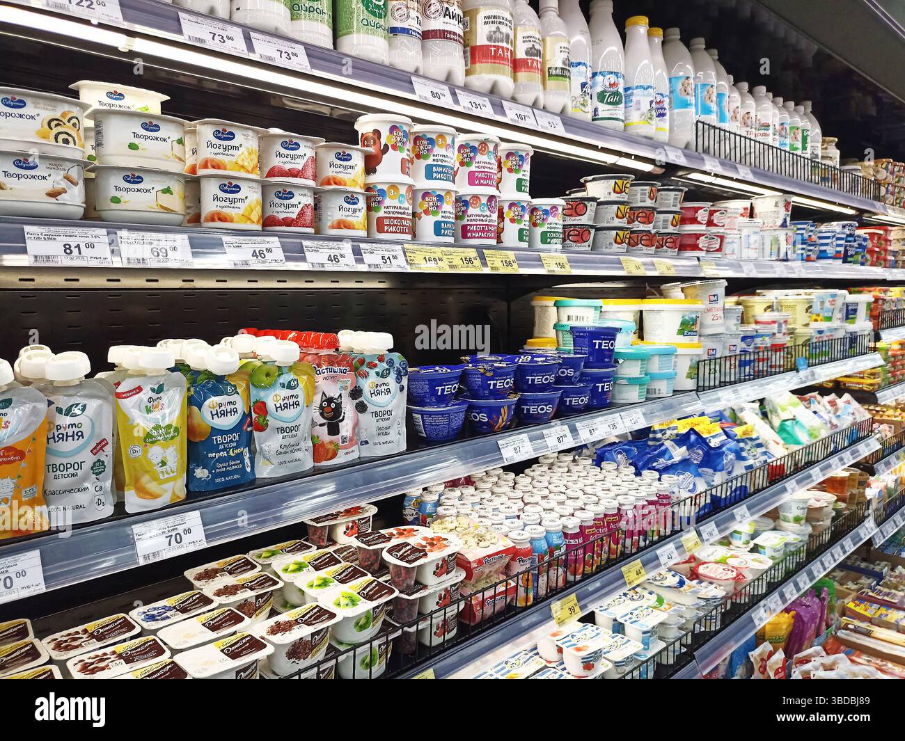 Grocery store dairy aisle with assorted yogurts and milk Stock Photo ...
