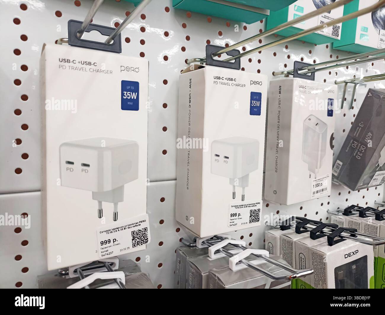 Usb-c wall chargers displayed on retail shelf with pricing Stock Photo ...