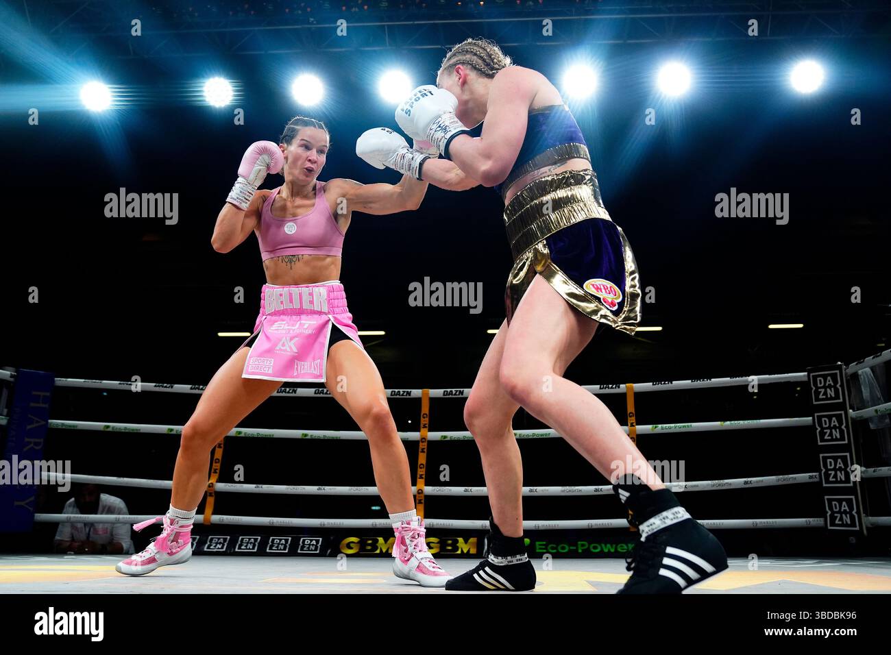 Terri Harper (left) and Natalie Zimmermann in action during their WBO ...
