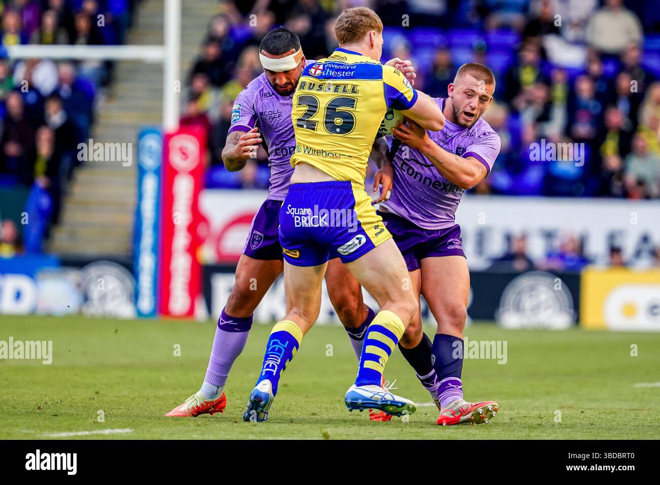 WARRINGTON, ENGLAND - MAY 23: Dan Russell is tackled by Mickey Lewis ...
