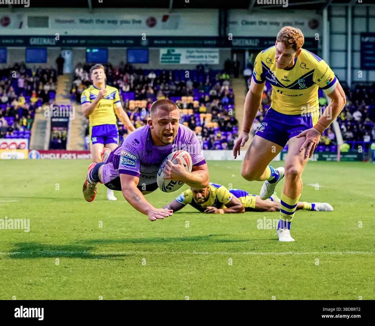 WARRINGTON, ENGLAND - MAY 23: Mickey Lewis flying try during the ...