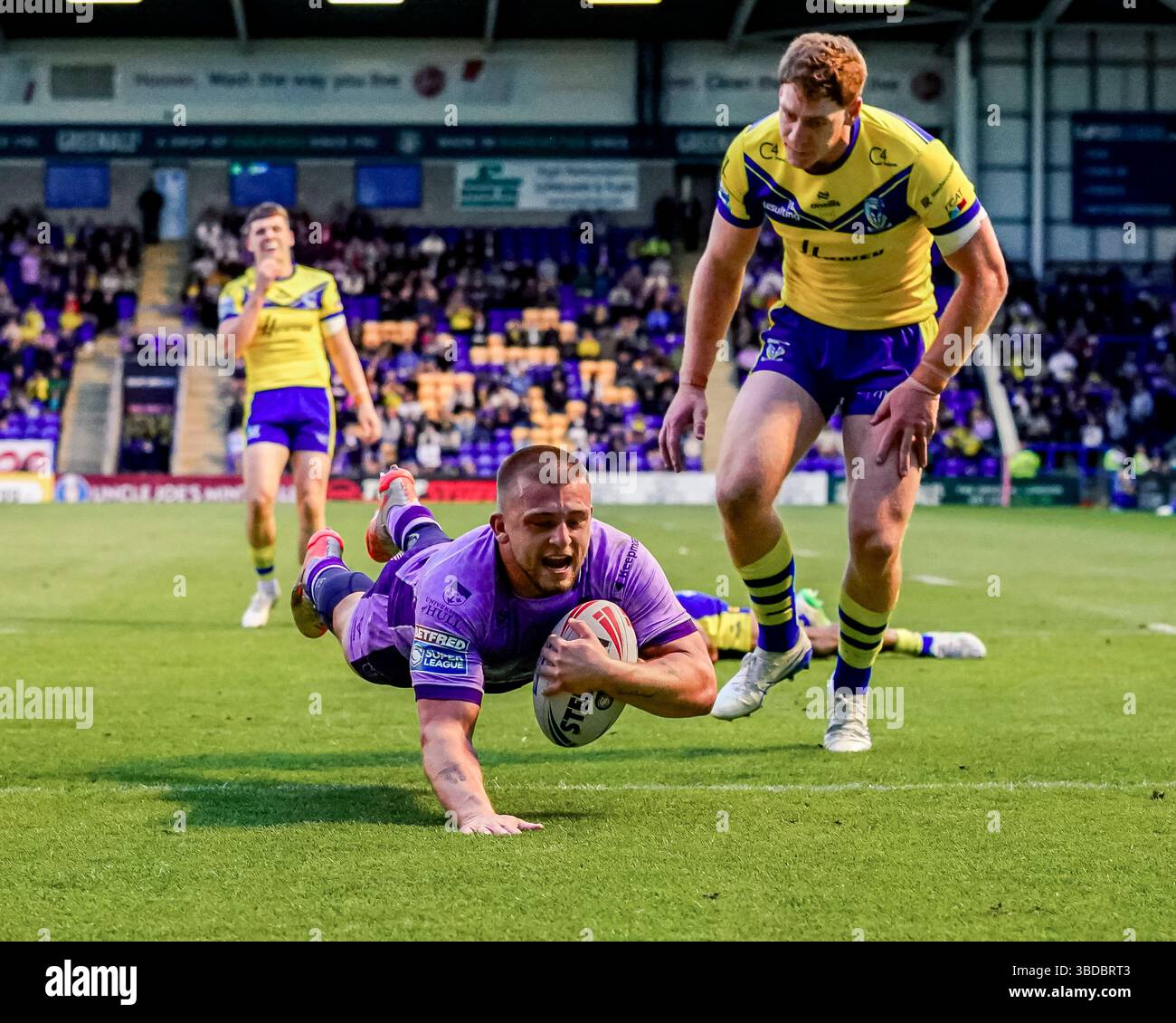 WARRINGTON, ENGLAND - MAY 23: Mickey Lewis flying try during the ...