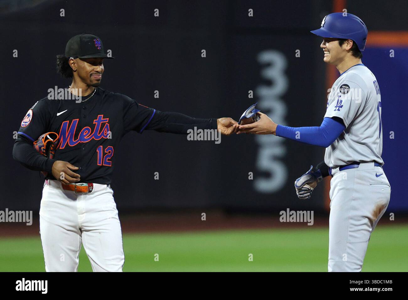 New York Mets shortstop Francisco Lindor, left, and Los Angeles Dodgers' Shohei Ohtani, right ...