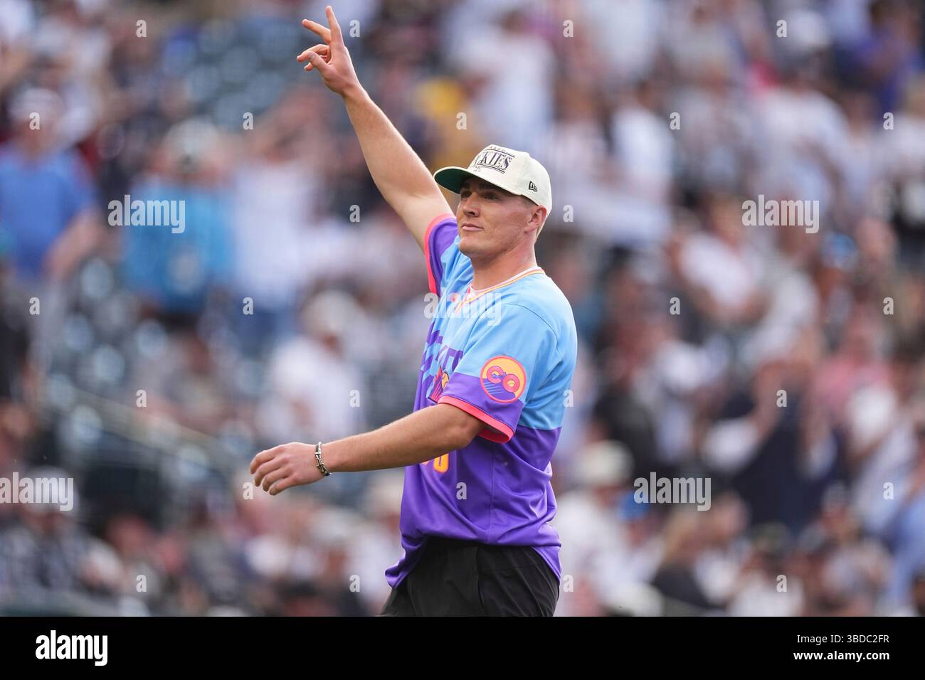 Denver Broncos quarterback Bo Nix gestures to the crowd after throwing ...