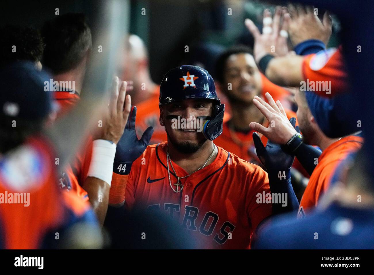 Houston Astros' Isaac Paredes celebrates in the dugout after hitting a ...