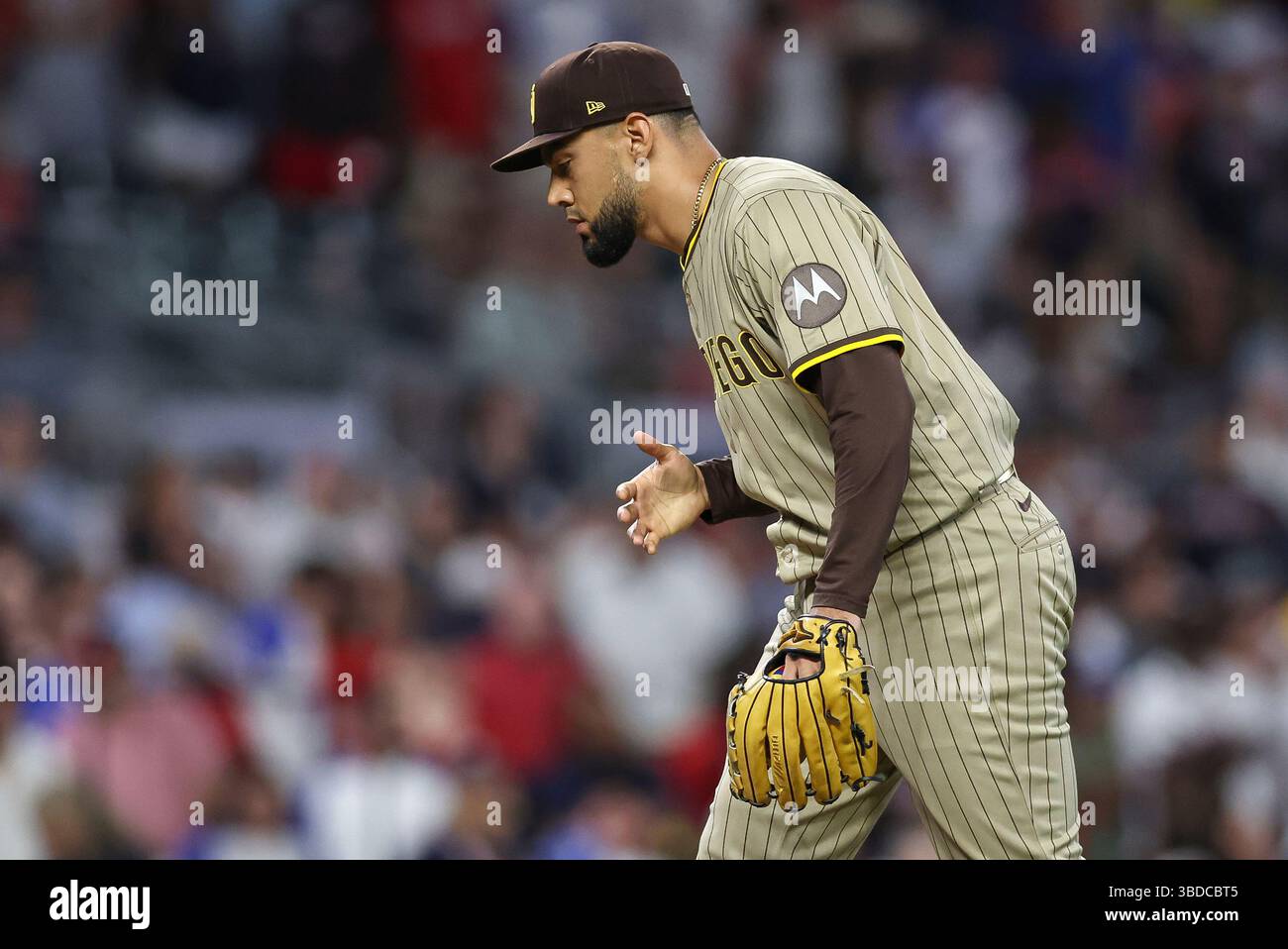 San Diego Padres pitcher Robert Suarez reacts after earning a save in a ...