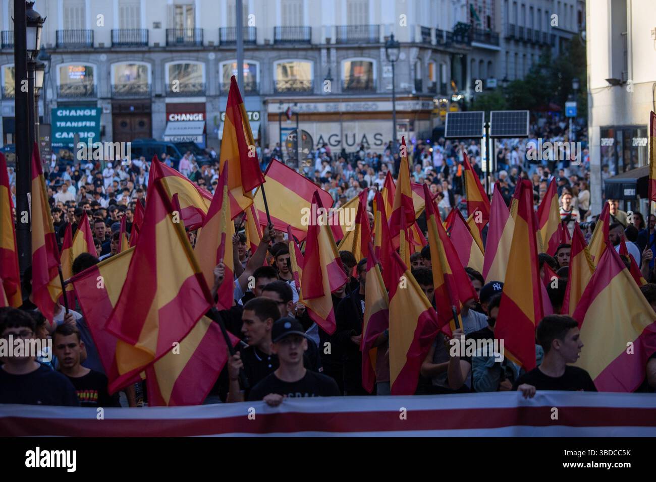 Madrid, Spain. 23rd May, 2025. A crowd of protesters holds Spanish ...