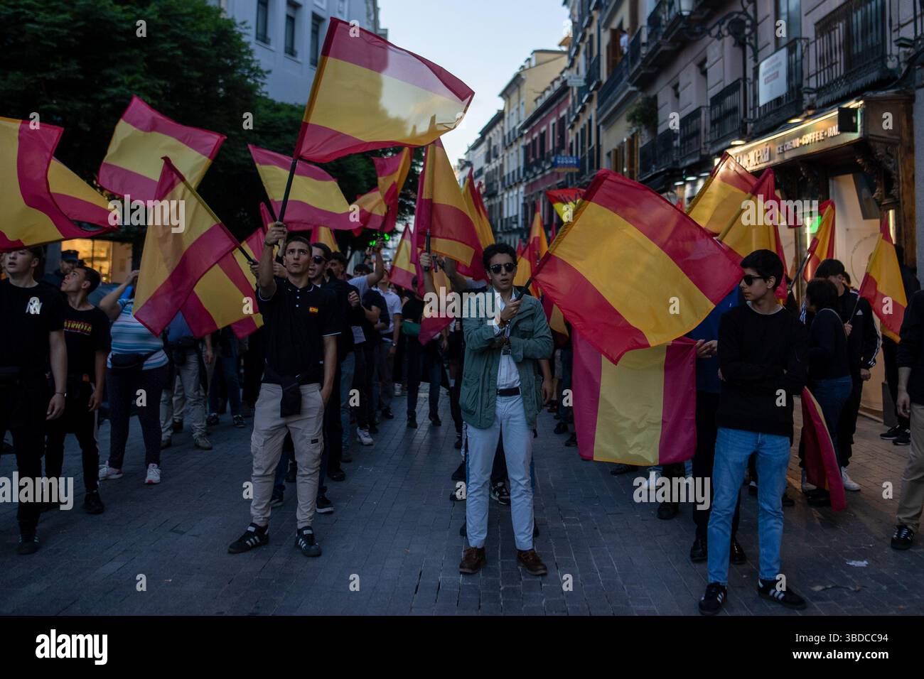 Madrid, Spain. 23rd May, 2025. A crowd of protesters holds Spanish ...