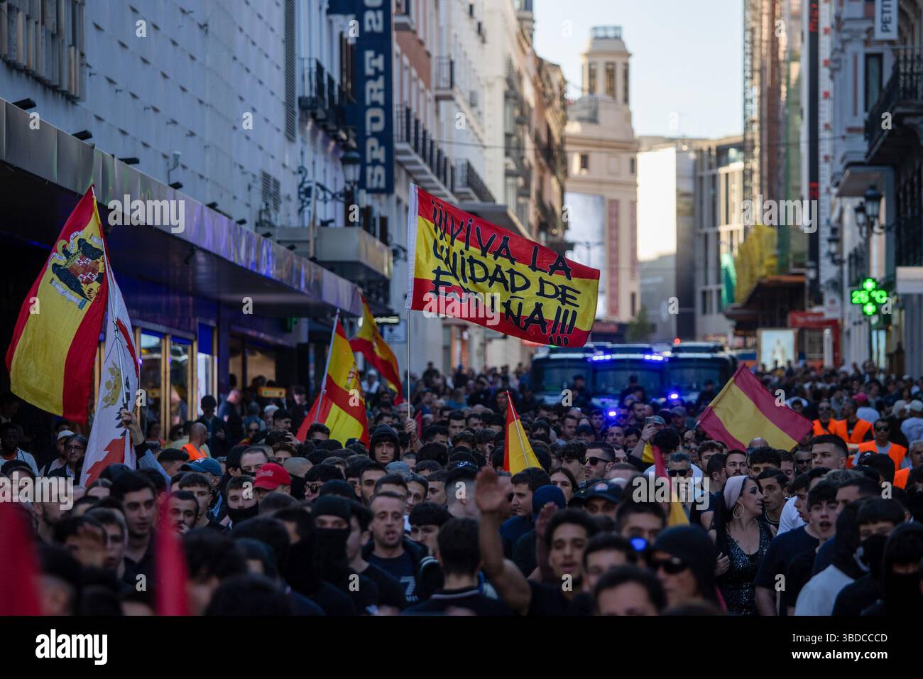 Madrid, Spain. 23rd May, 2025. Protesters hold Spanish flags during a ...