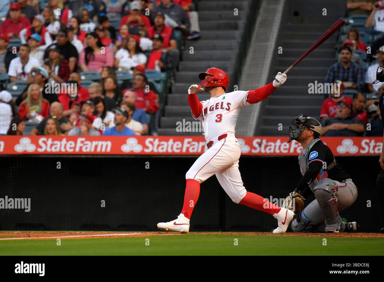 Los Angeles Angels' Taylor Ward, left, hits a solo home run as Miami ...