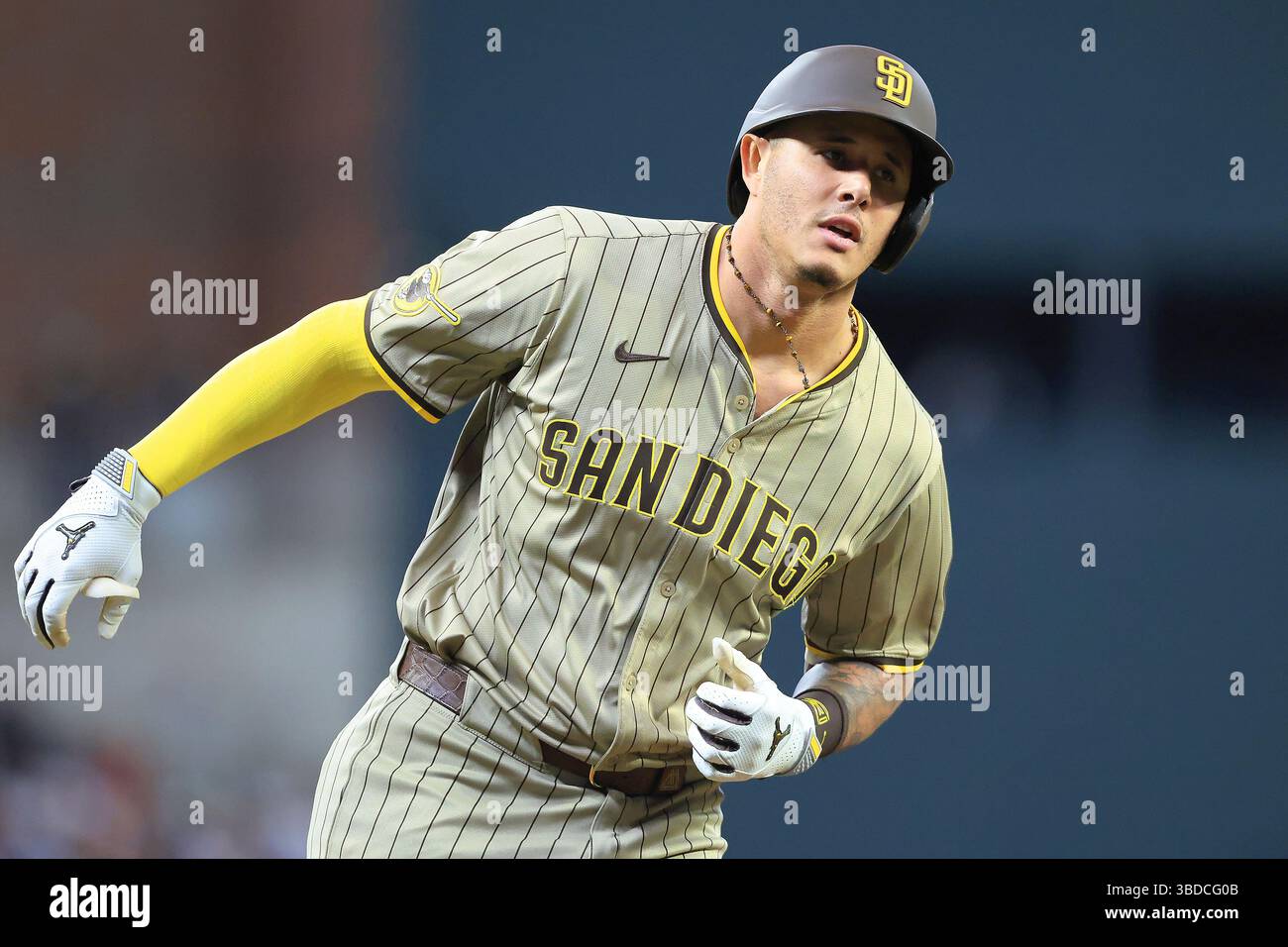 ATLANTA, GA - MAY 23: Manny Machado #13 of the San Diego Padres circles ...