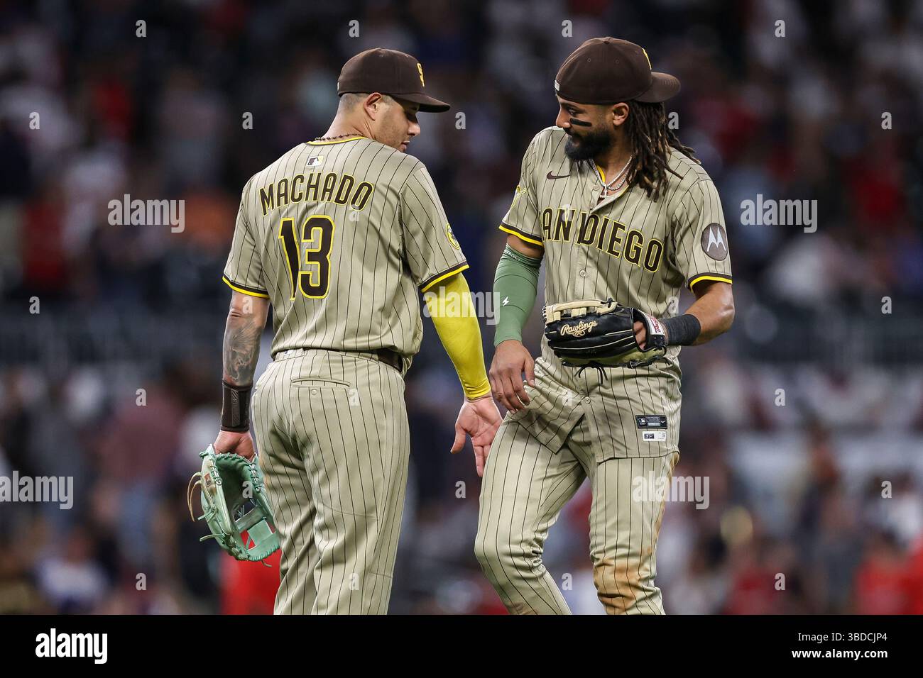 San Diego Padres third baseman Manny Machado (13) and outfielder ...
