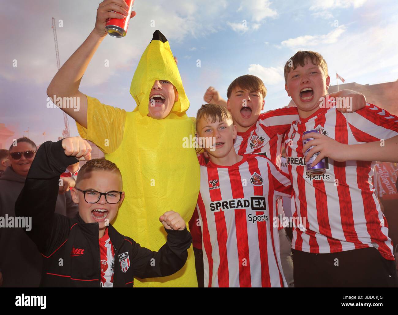 A group of fans, one dressed as a banana enjoy themselves in preparation for the play off match ...