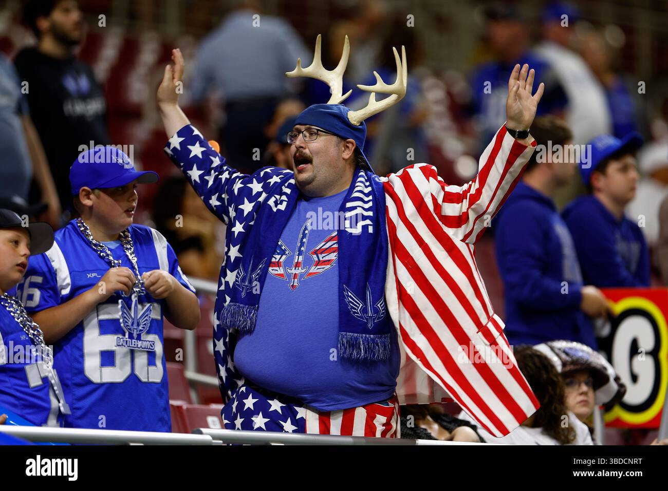 ST. LOUIS, MO - MAY 23: A St. Louis Battlehawks fan celebrates during a ...
