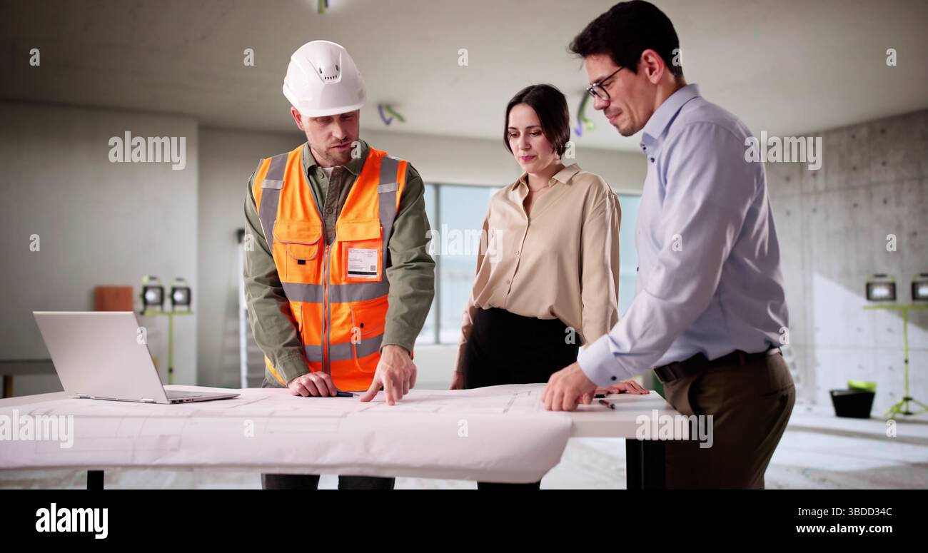 Engineer And Architect Inspecting Blueprint With Young Couple In Home ...