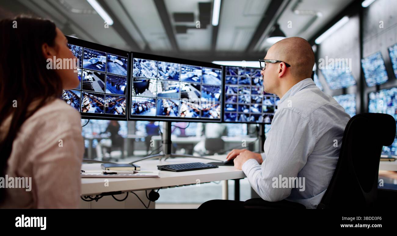 Security Manager Monitors Multiple CCTV Cameras For Surveillance ...