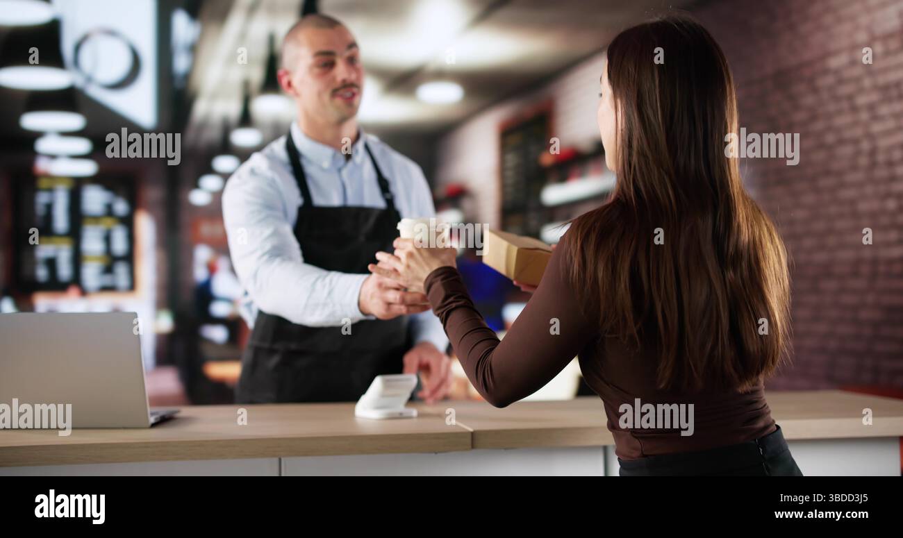 Woman Buys Cappuccino At Coffee Shop, Serves Customers With Smile Stock ...