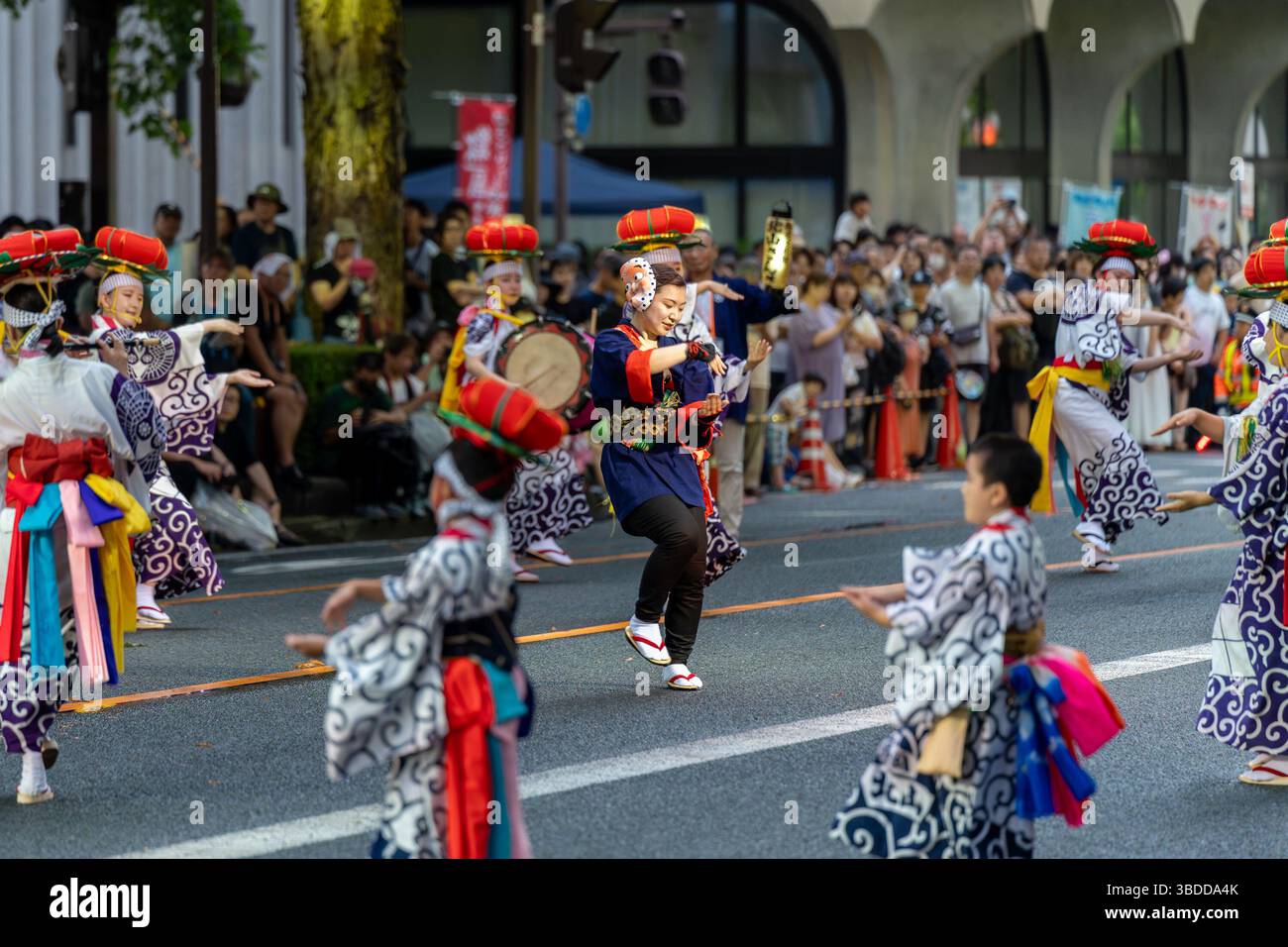 Participants engaging in a lively Wa-odori, a traditional circle dance ...
