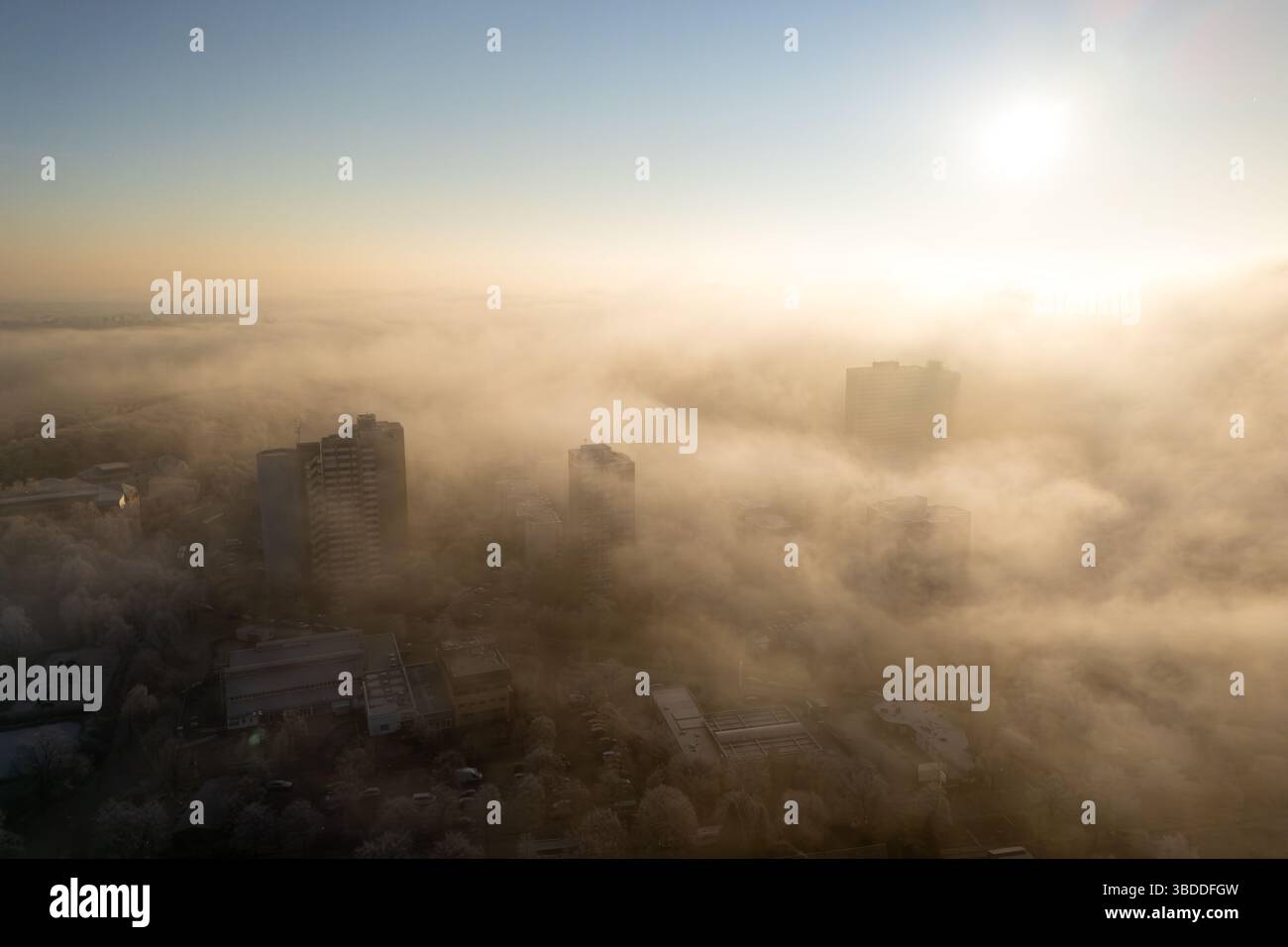 Aerial picture of high-rise buildings in the morning fog during ...
