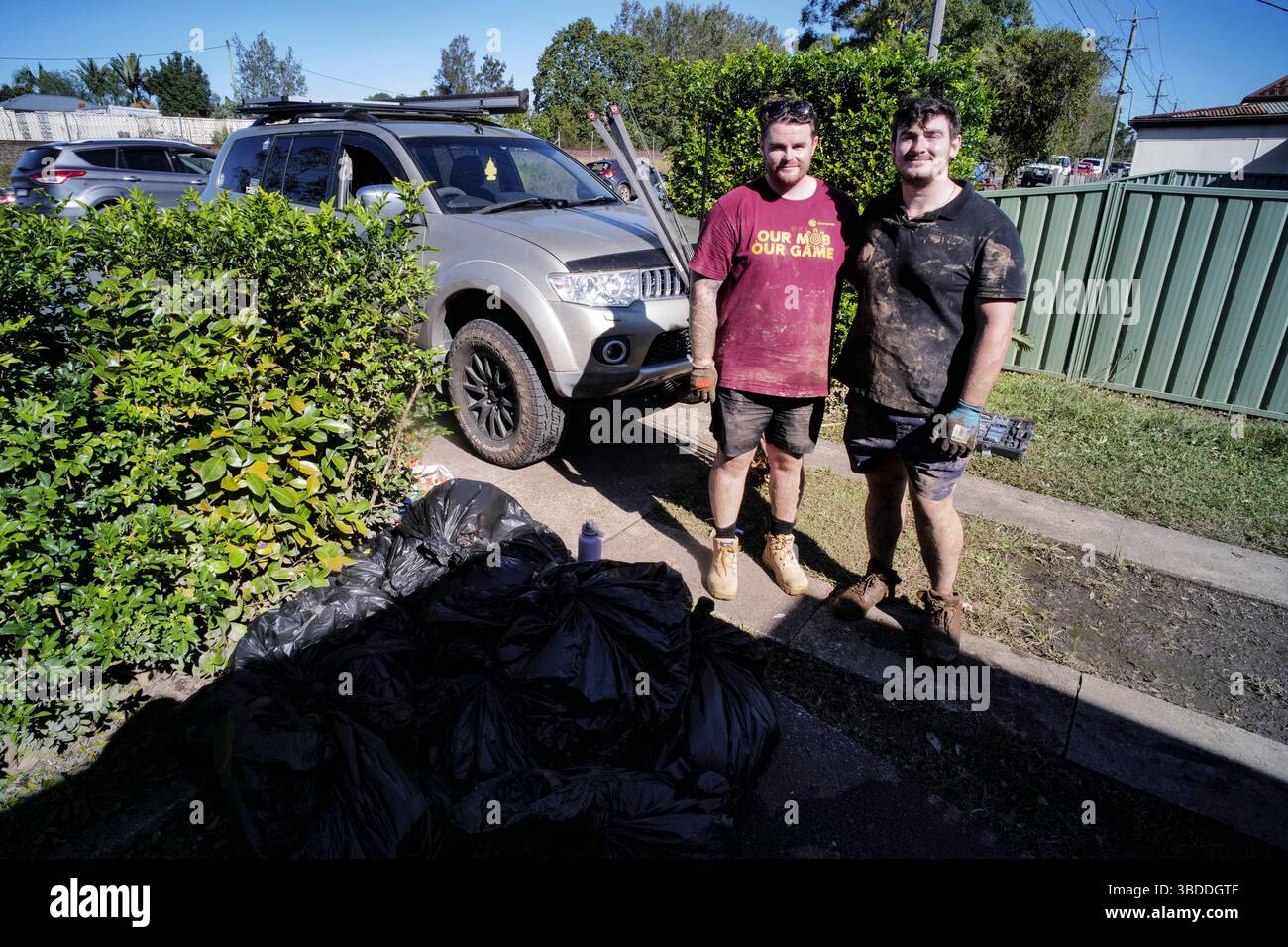 Taree, Australia. 24th May, 2025. Local residents are seen cleaning up ...