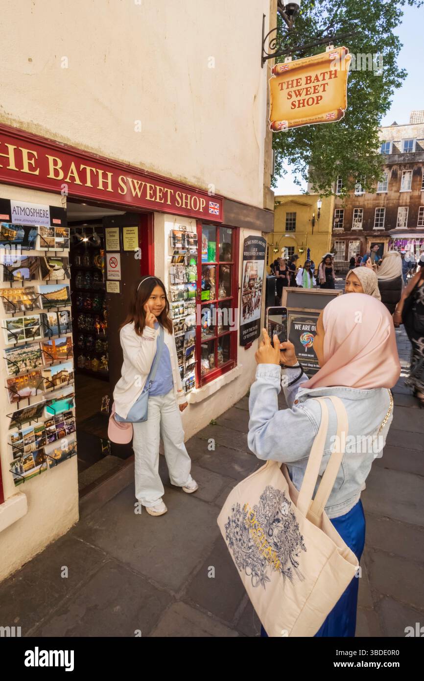 England, Somerset, Bath, Abbey Green, Asian Tourists Taking Souvenir ...