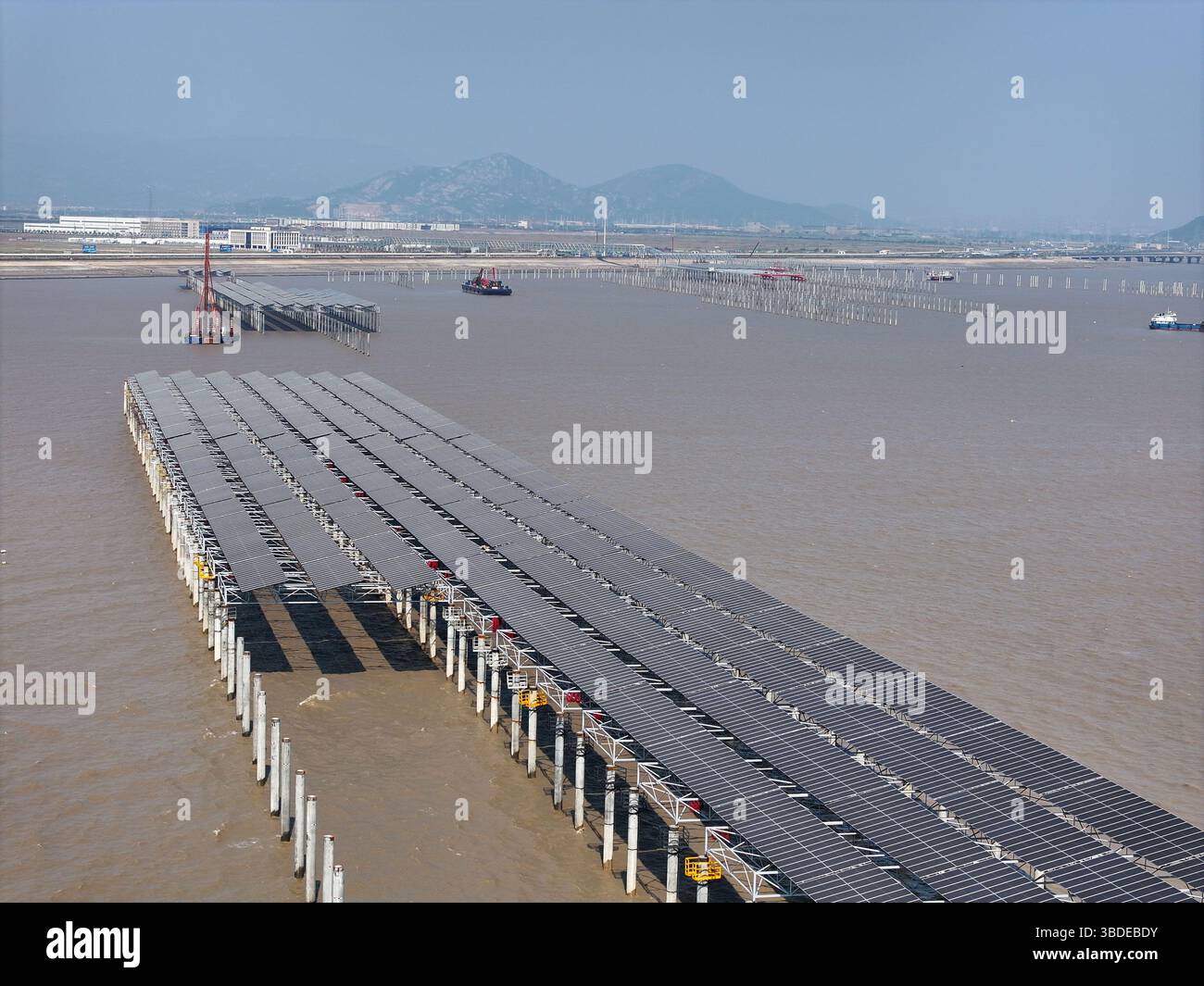 Construction workers are conducting offshore operations at the ...