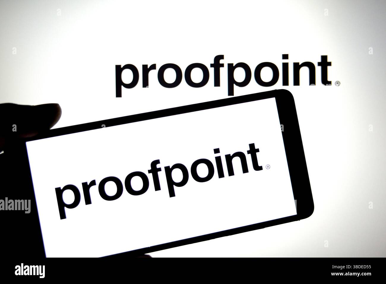 In this photo illustration, a Proofpoint logo is seen displayed on a ...