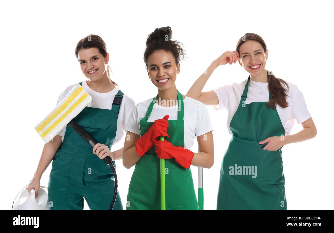 Cleaning team with supplies on white background Stock Photo - Alamy