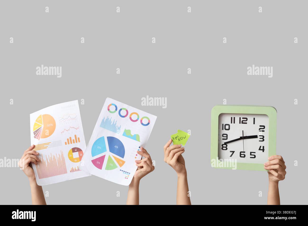 Female hands with diagrams and clock on grey background. Time ...