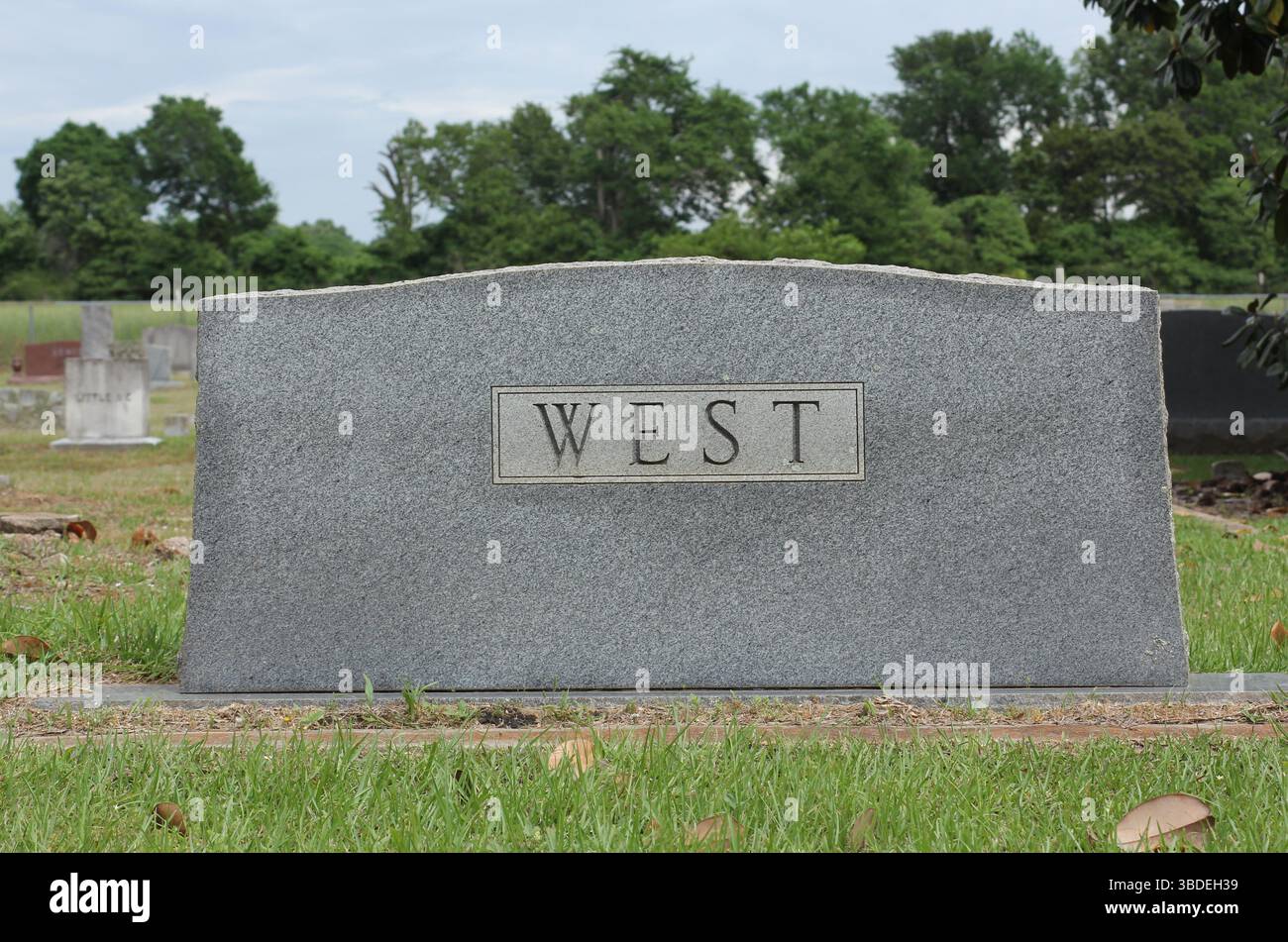 Headstone in Cemetery With Word West, Death Concept Stock Photo - Alamy