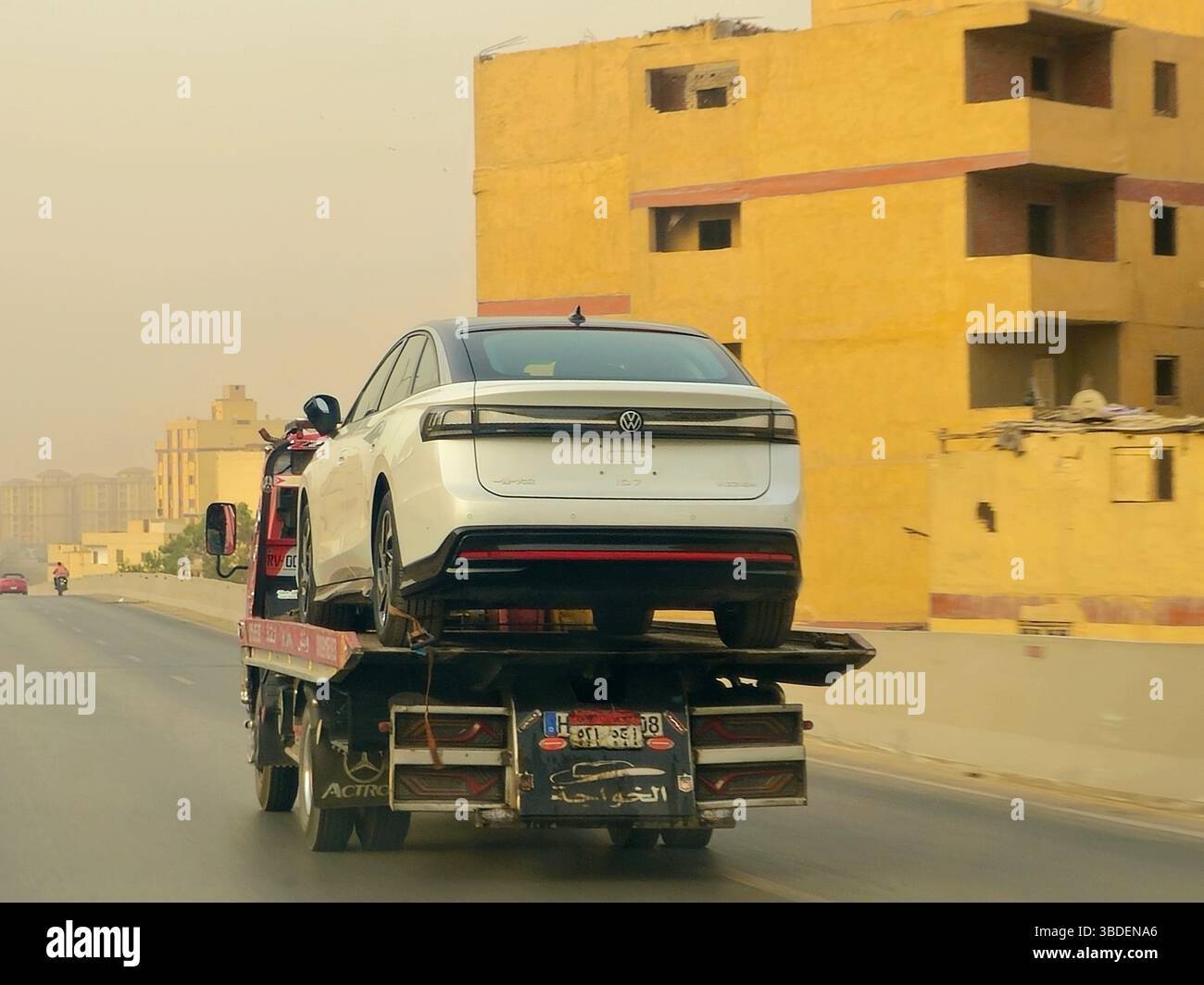 Cairo, Egypt, May 17 2025: tow recovery transporter hydraulic flatbed ...