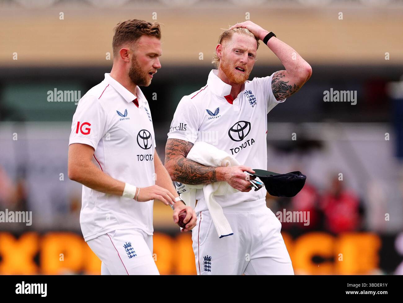 England's Sam Cook and Ben Stokes (right) on day three of the Rothesay ...