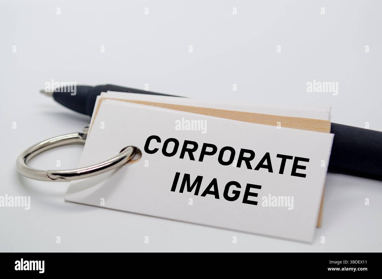 Corporate image label on white notepad representing business branding ...