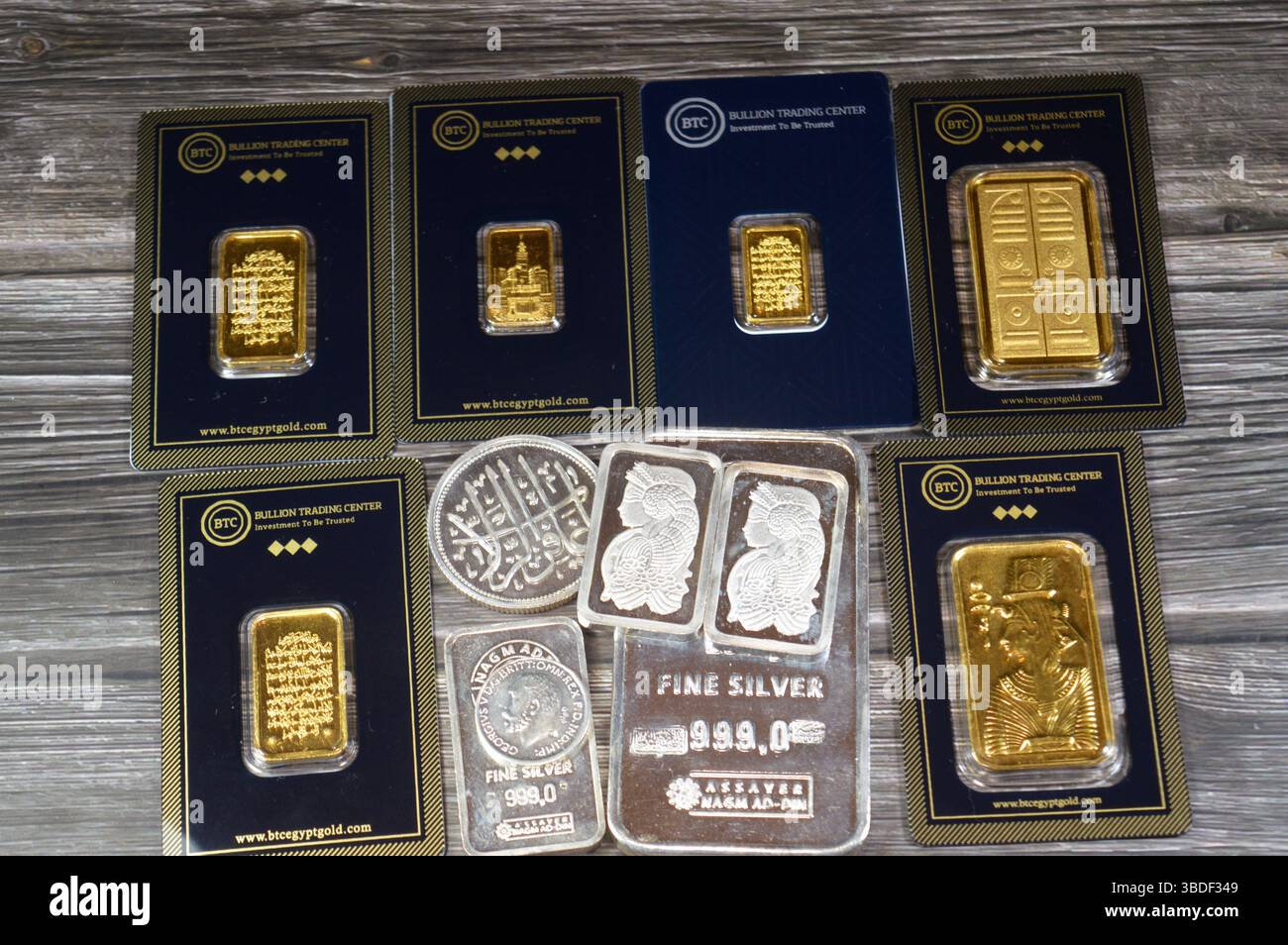 Cairo, Egypt, May 16 2025: BTC Bullion Trading Center pure gold bars and fine silver bars of ...