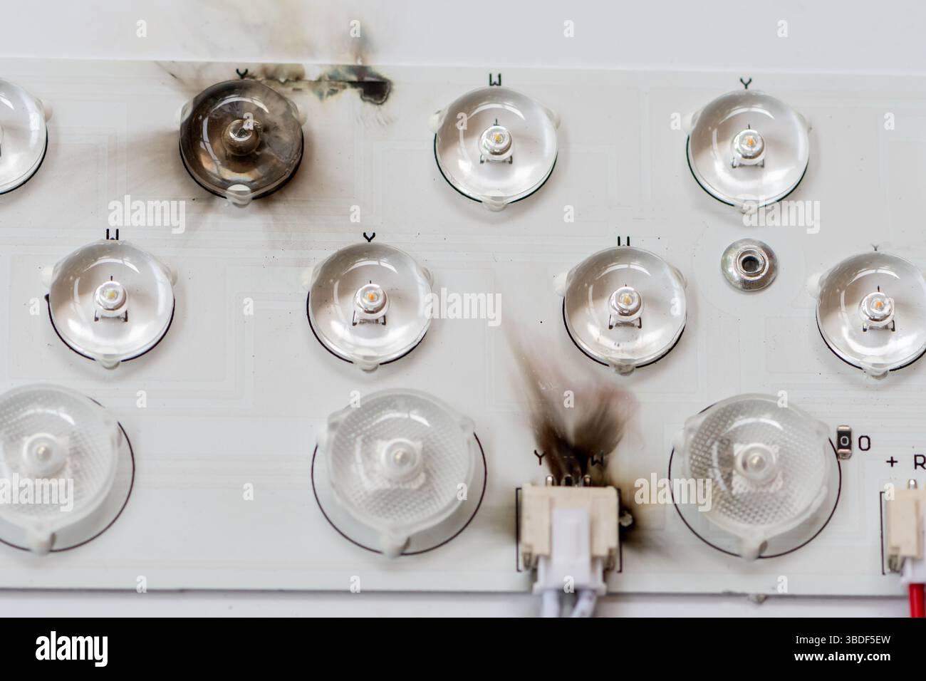 Burnt out LED backlight with visible soot marks and damage to the ...