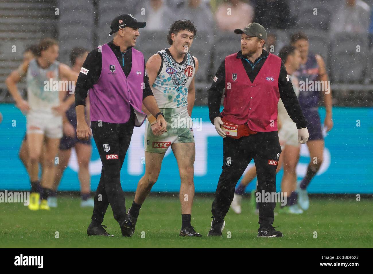 Perth, Australia. 24th May, 2025. Darcy Byrne-Jones of the Power leaves ...