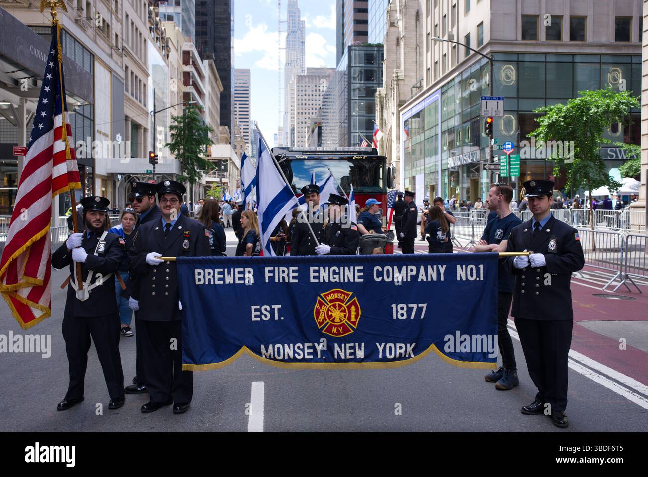 Firefighters from the Brewer Fire Engine Company No.1 of Monsey, New ...