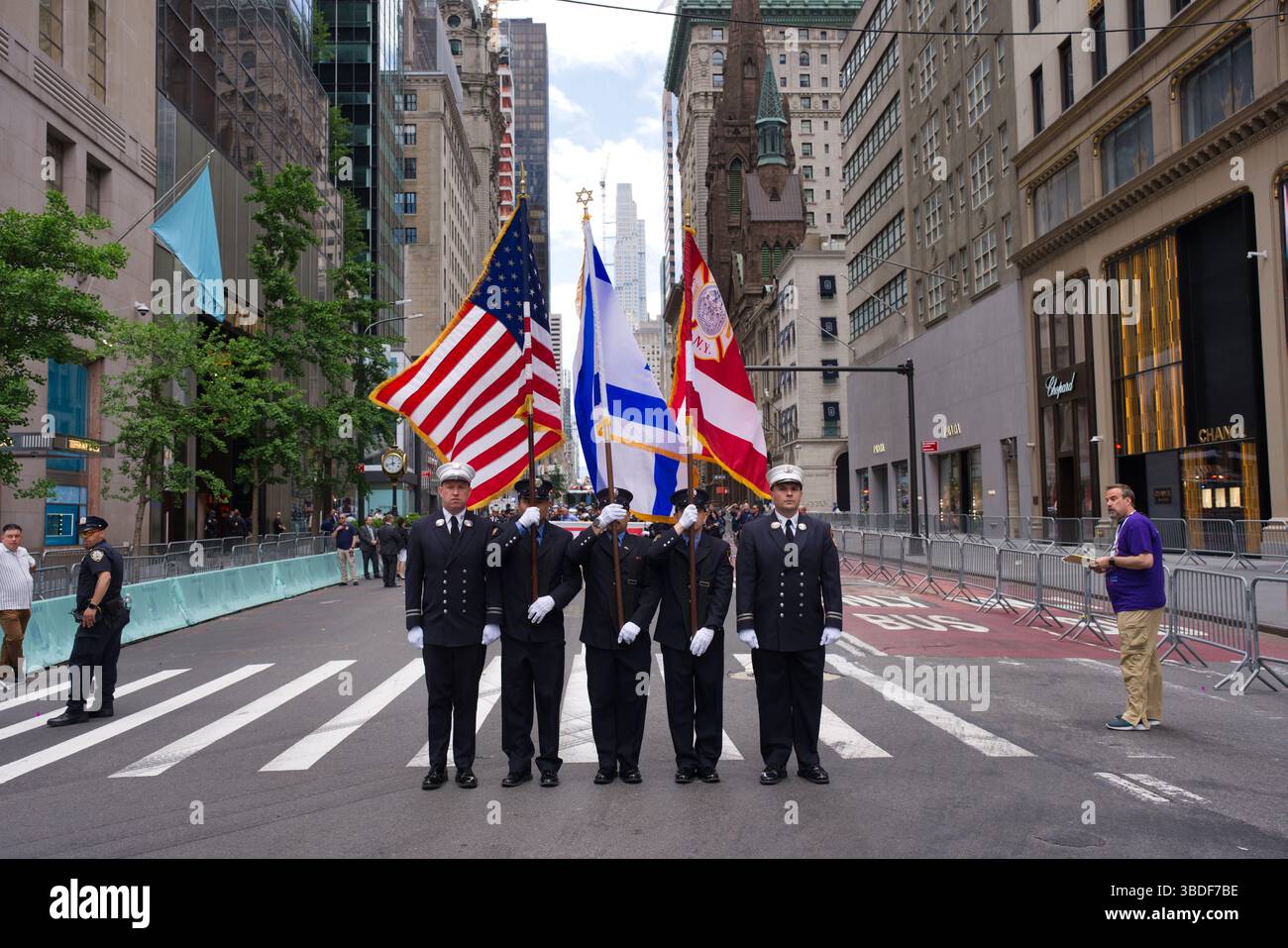 Four firefighters in New York City hold American, Israeli, and FDNY ...