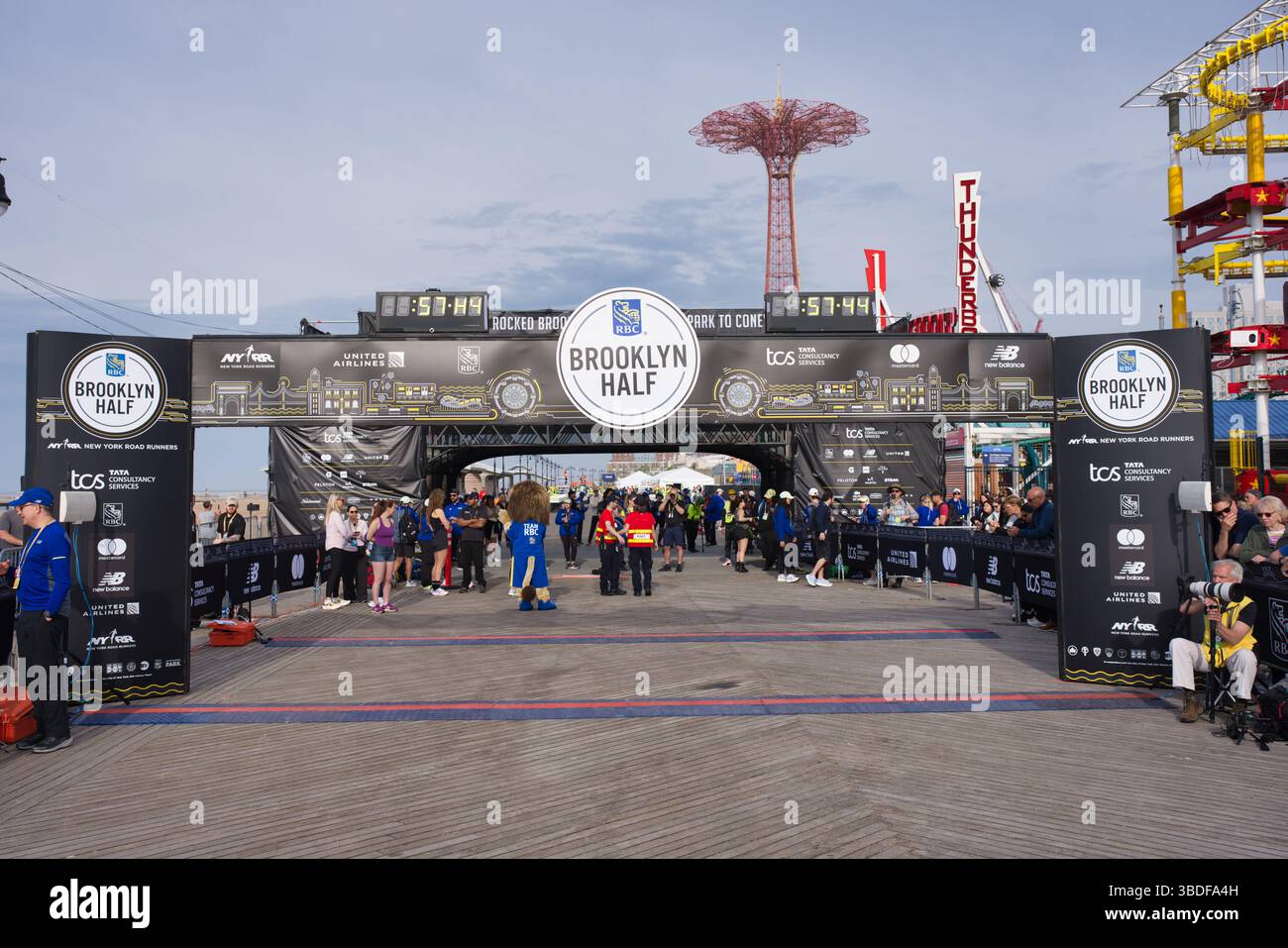 Finish line of the Brooklyn Half marathon. Runners are approaching the ...
