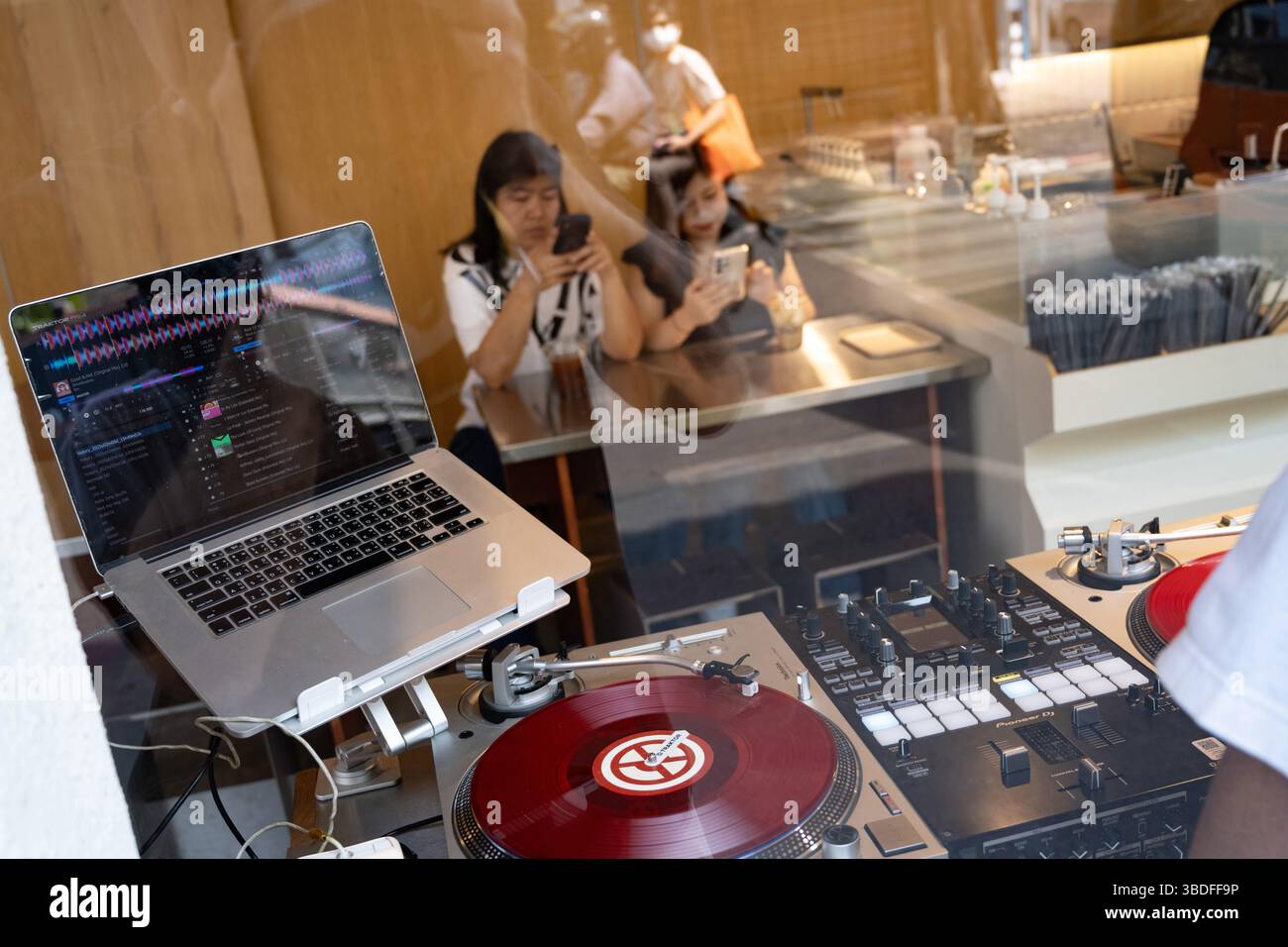 Bangkok, Thailand. March 25th 2025. A DJ deck set up inside a popular ...